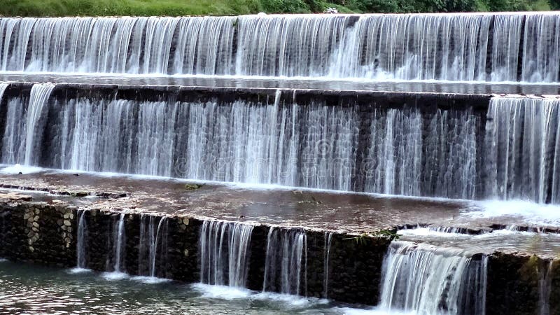 The Gentle Flow of the River, between the Leaves and the Beautiful Rock ...