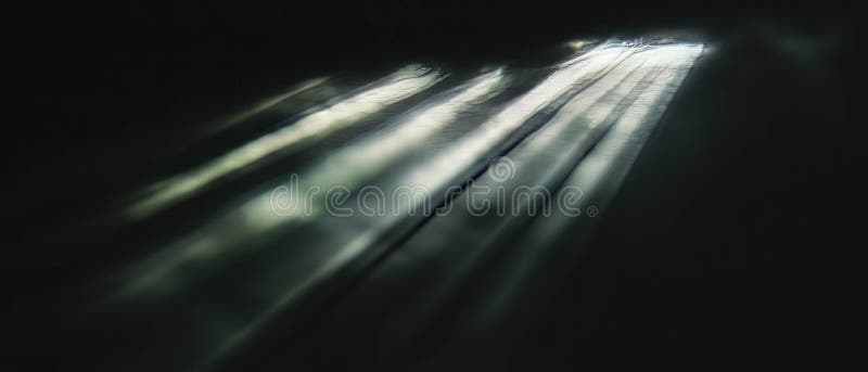 Gentle Light Overlay with Soft Edges Creates a Glowing Effect on a Dark ...