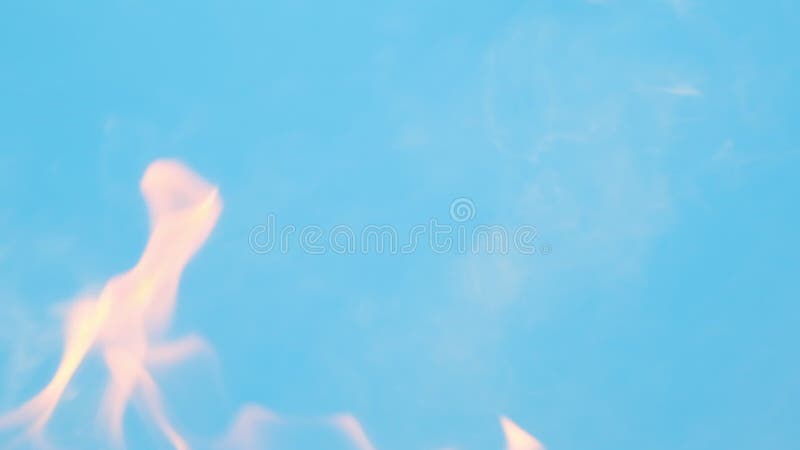Gentle Pink Flames on a Blue Background. Slow-motion Video of Fire and ...