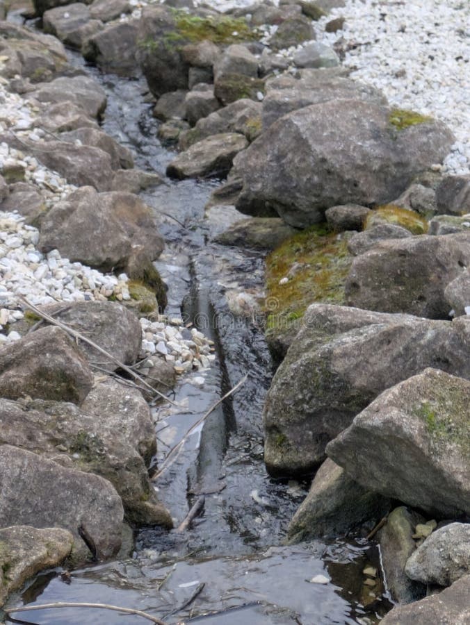 A Gentle Stone Stream with Rocks and Flowing Water Stock Image - Image ...