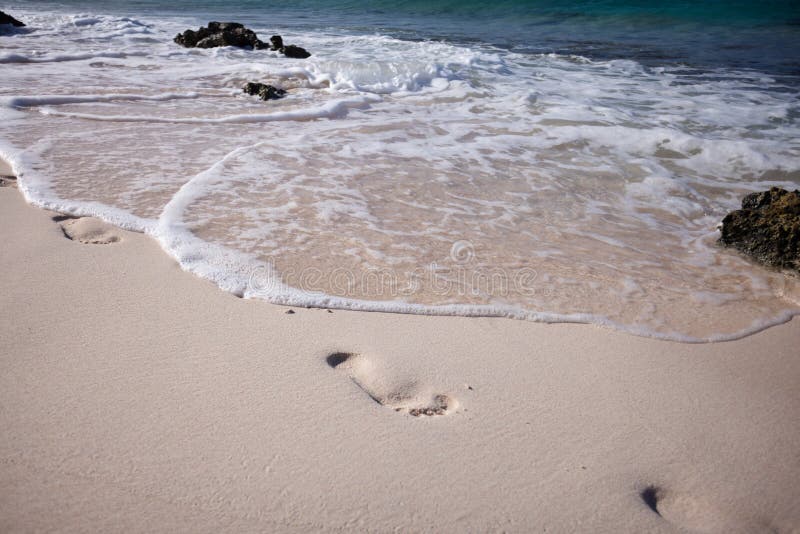 Gentle Wave Washed Away the Footprints on the Sand Beach. Stock Photo ...