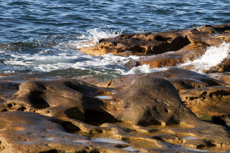 Gentle Waves Breaking Over Rocks in Sydney Harbour Stock Photo - Image ...