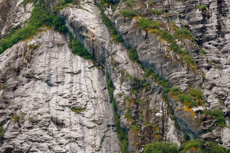 Gently Eroded Rock Cliff with Lichen and Water Stains Stock Photo ...