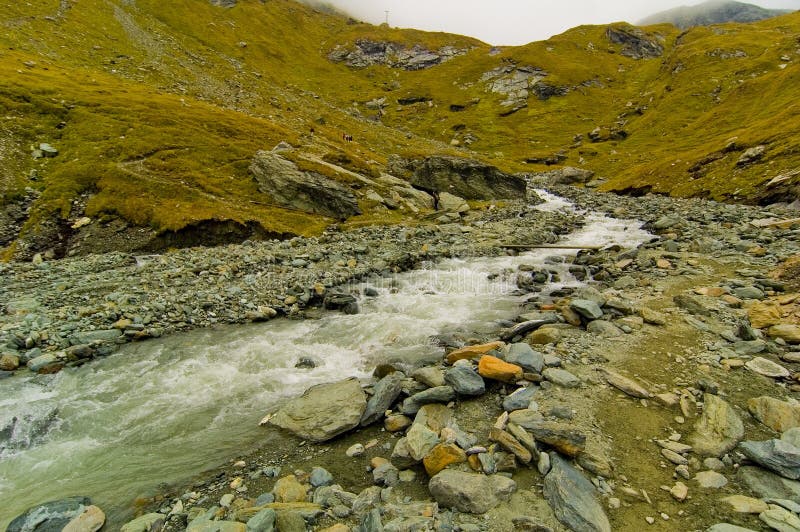 Gently Flowing River stock photo. Image of rocks, hills - 1831428