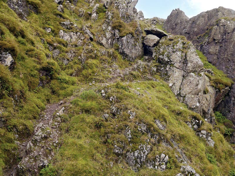 High Hillside Path with Tiny Tunnel Stock Photo - Image of lake, rugged ...