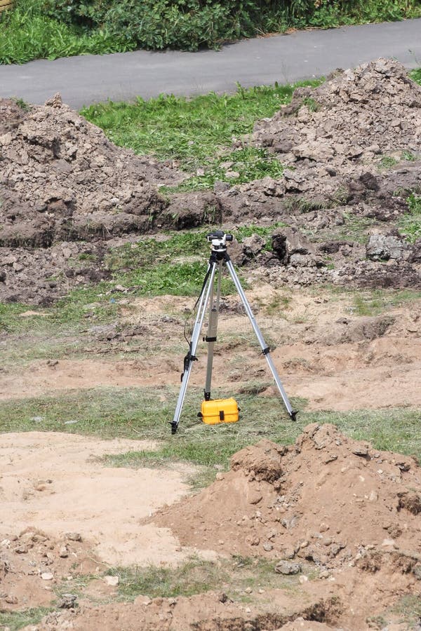 Geodetic Instrument on a Tripod Stock Photo - Image of build, work ...