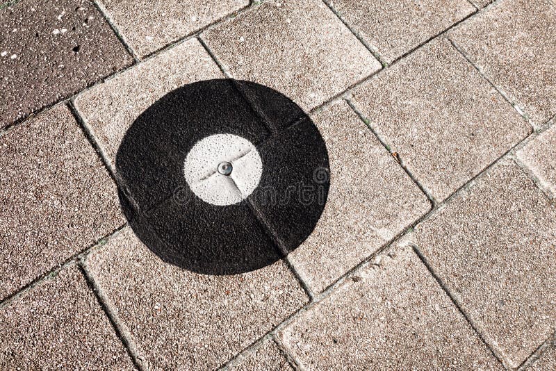 Geodetic Survey Marker Set in a Pavement. Stock Image - Image of ...
