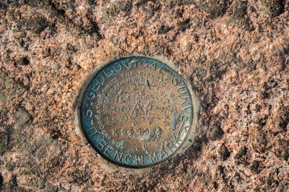 Geological Survey Benchmark Embedded in Rock Stock Image - Image of ...