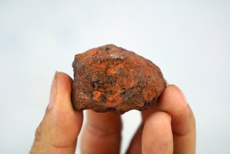 Geologist S Hand is Holding a Specimen of Raw Psilomelane Mineral Stone ... Geologist S Hand is Holding a Specimen of Raw Psilomelane Mineral Stone ...
