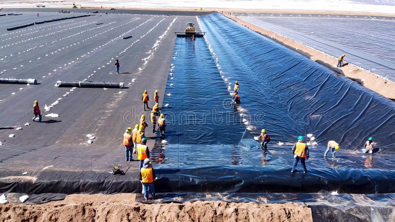Geomembrane Deployment and Installation Process with Machinery in the ...