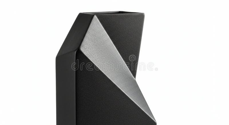 Geometric Black Object with a Modern, Angular Design Featuring a Matte ...