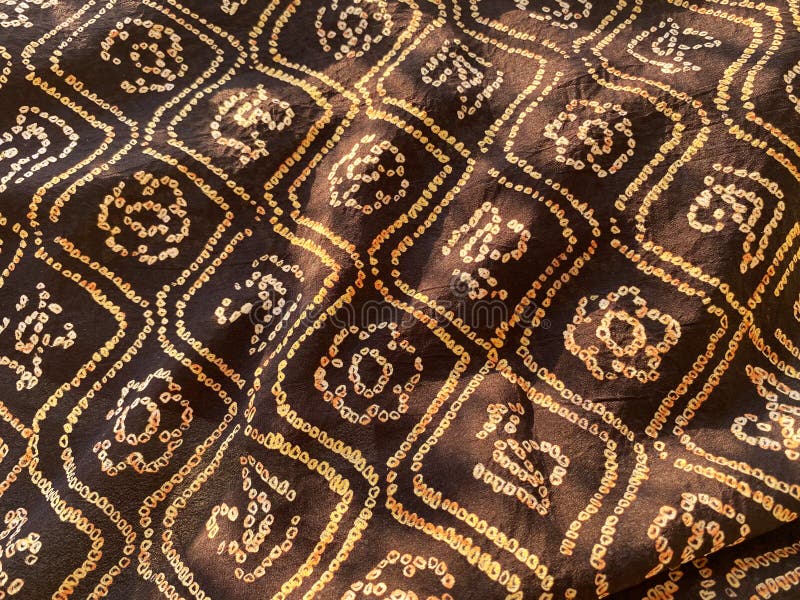 The Geometric Designs Create a Striking Visual, while the Smooth Crepe ...