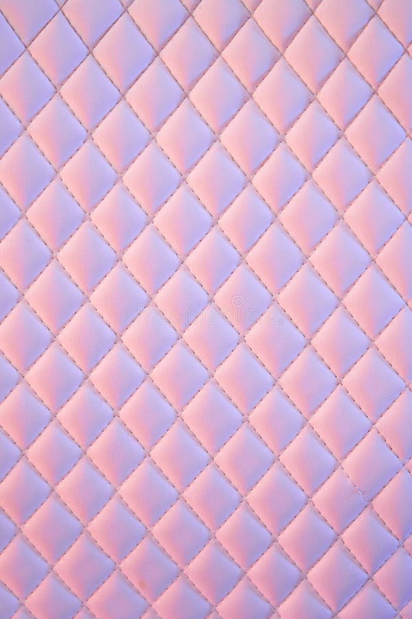 Geometric Diamond Pattern Quilted PU Leather in Neon Light Stock Photo ...