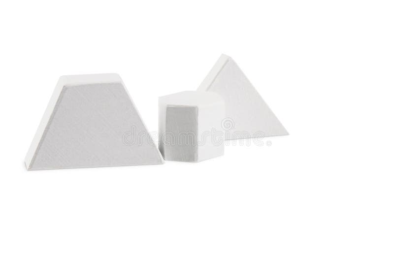 Geometric Figures Made of Wood, Painted and Stacked on a Table Stock ...