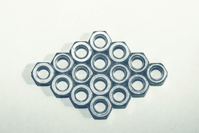 Geometric Metal Nuts. Industrial Tool Stock Photo - Image of center ...