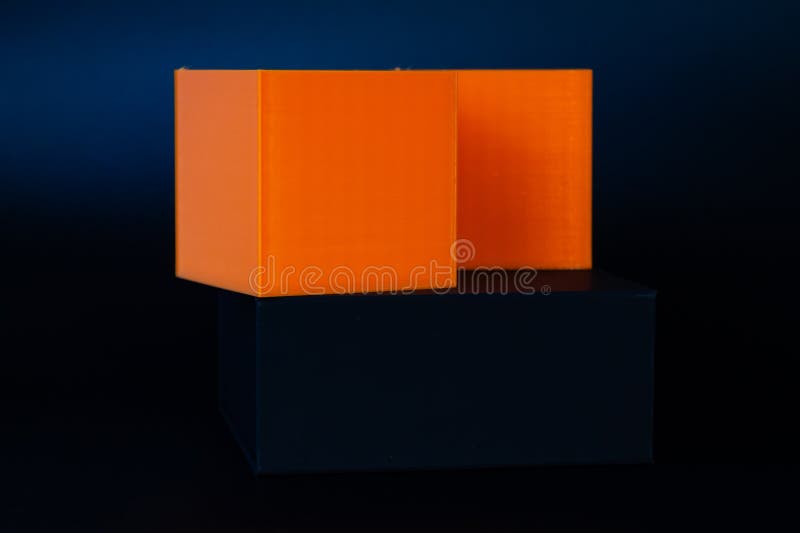 Geometric Orange Cubes Made of 3d Plastic on a Black Box, Minimalist ...