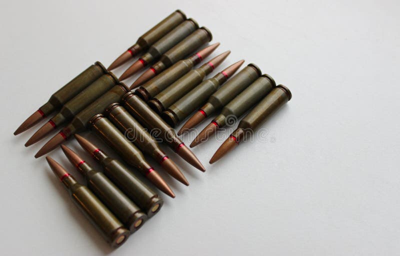 Geometric Pattern of Ammunition Cartridges on a White Background on the ...
