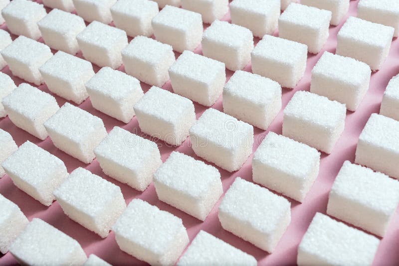 Geometric Pattern with Refined Sugar on a Pink Background Stock Image ...