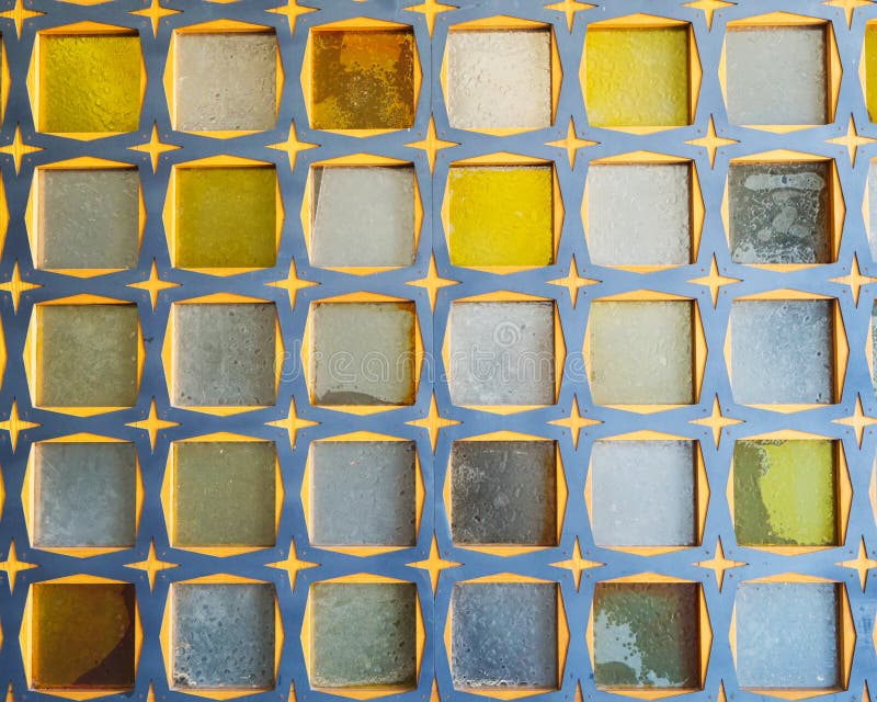 Geometric Pattern. Wall Made of Glass Blocks in Blue-yellow Colors ...