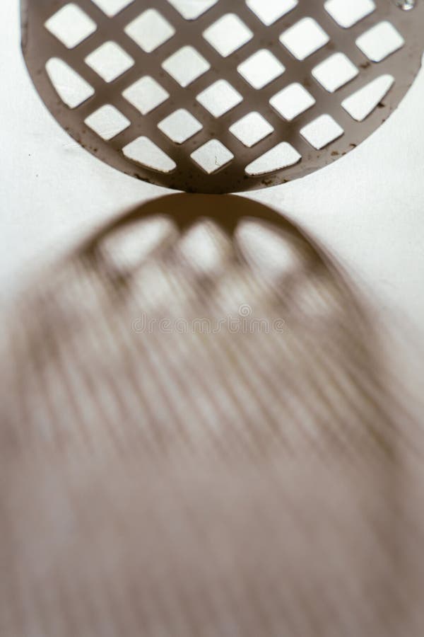 Creative Abstract Shadow Pattern Formed by a Grid on a Textured Surface ...