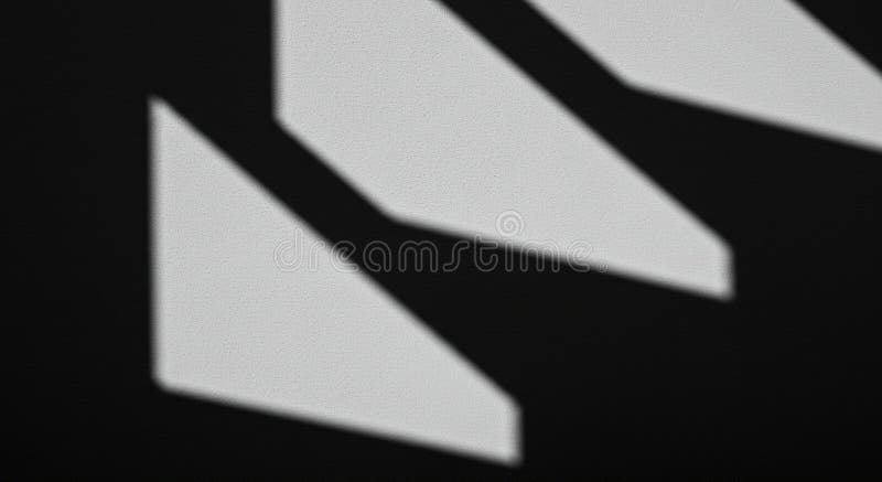 Geometric Shadows Form on a Textured, Light-colored Surface. Triangular ...