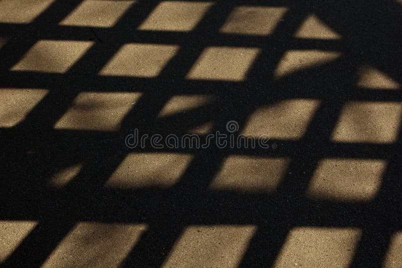 Geometric Shadows from the Grid on the Ground. View from Above Stock ...