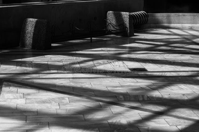 Geometric Shadows in a Public Space, Shadows Cast on Pavement with ...