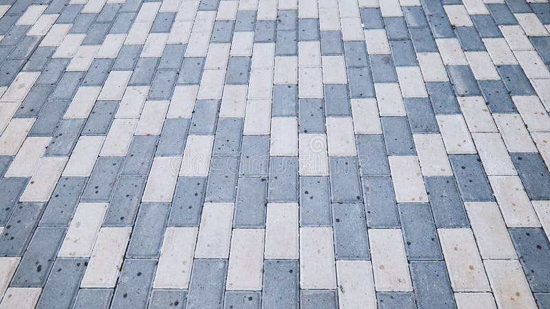 Geometric Urban Pavement with Interlocking Gray and White Stones ...