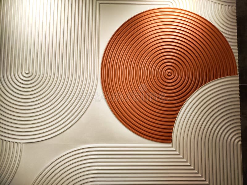 Geometric Wall Design Featuring Circular Patterns in White and Orange ...