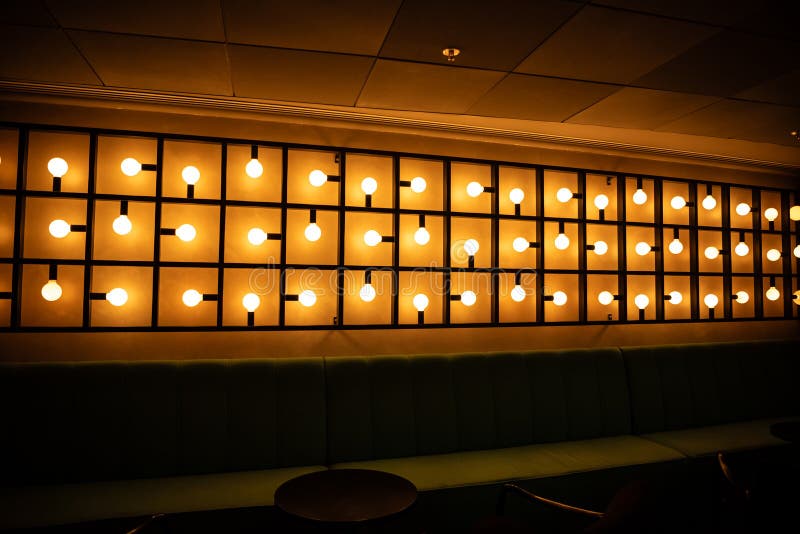 Geometric Wall Lighting with Round Bulbs in Modern Lounge Stock Image ...