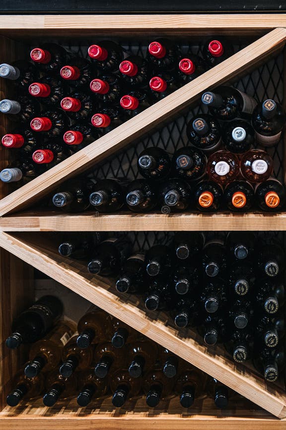 Geometric Wine Rack Filled with Assorted Bottles. Well-stocked Wine ...