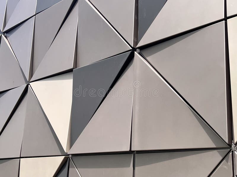 Geometrical Triangular Shape on Metal Building Wall Stock Image - Image ...