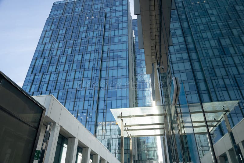 The Geometry of Modern Urban Architecture is Reflected in the Glass ...