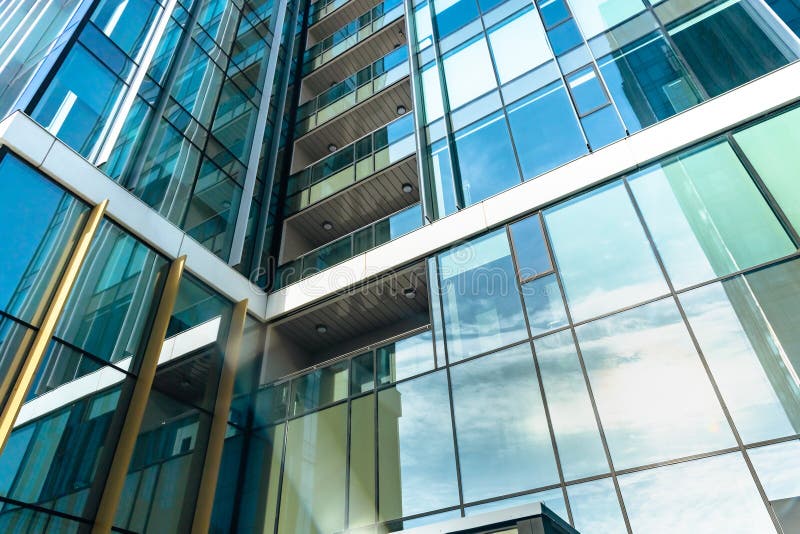 The Geometry of Modern Urban Architecture is Reflected in the Glass ...