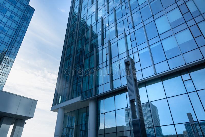 The Geometry of Modern Urban Architecture is Reflected in the Glass ...