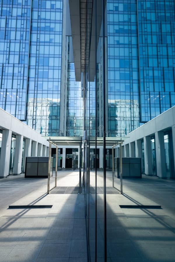 The Geometry of Modern Urban Architecture is Reflected in the Glass ...