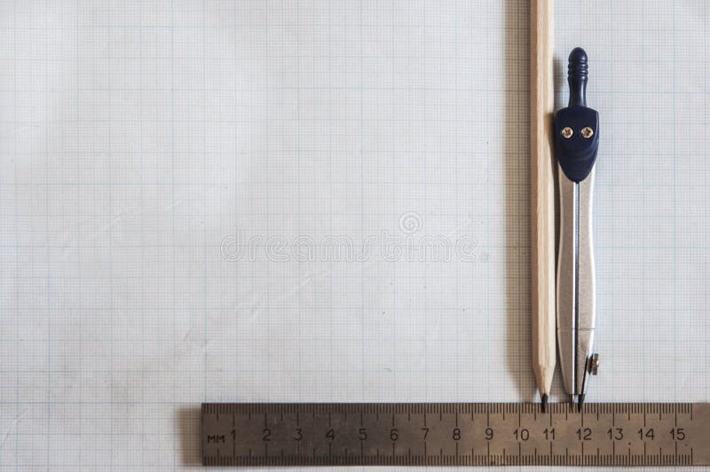 Pencil, Compass and Rulers on Graph Paper Background Stock Photo ...