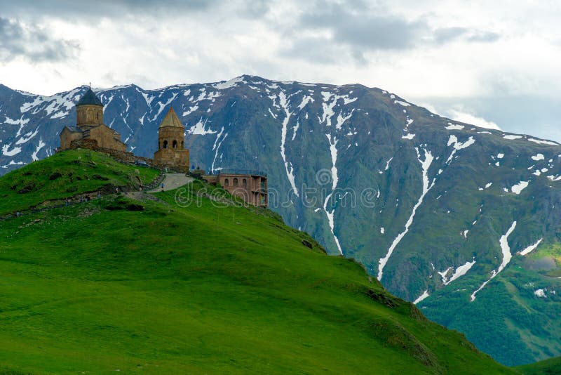 Gergeti Holy Trinity Church and Kazbegi Mountain from Stepancminda ...