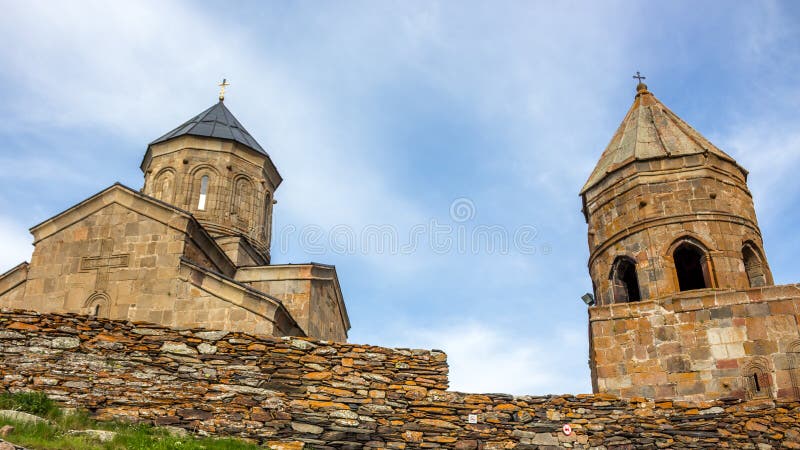 Gergeti Trinity Church in the Mountains of the Caucasus Stock Image ...