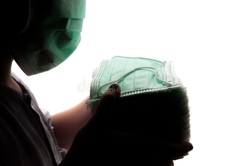 Germ Protection Mask in the Hand on a White Background Stock Photo ...