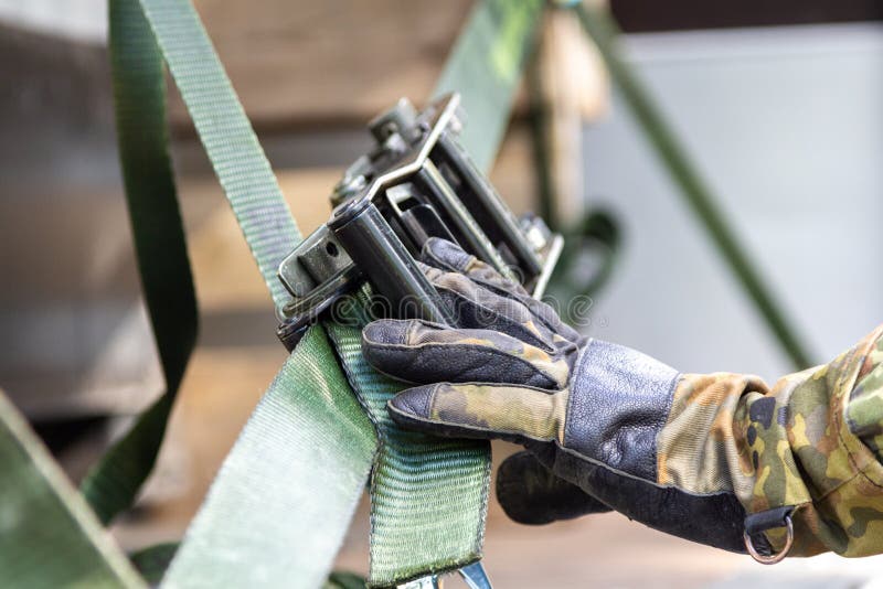 Cargo Lashing Material Lies on Ground Near a Truck Stock Photo - Image ...