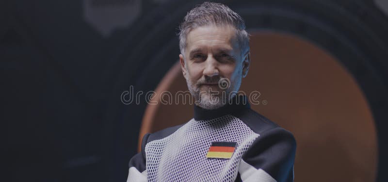 German Astronaut Smiling at Camera Stock Photo - Image of uniform ...