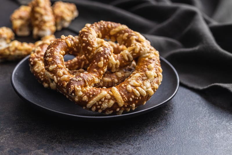 German Bread Pretzel with Baked Cheese on Kitchen Table Stock Image ...