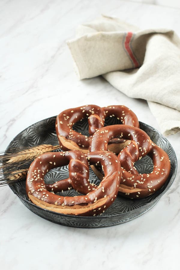 German Brezel Pretzel with Chives, Butter and Cream Cheese on Bakery ...