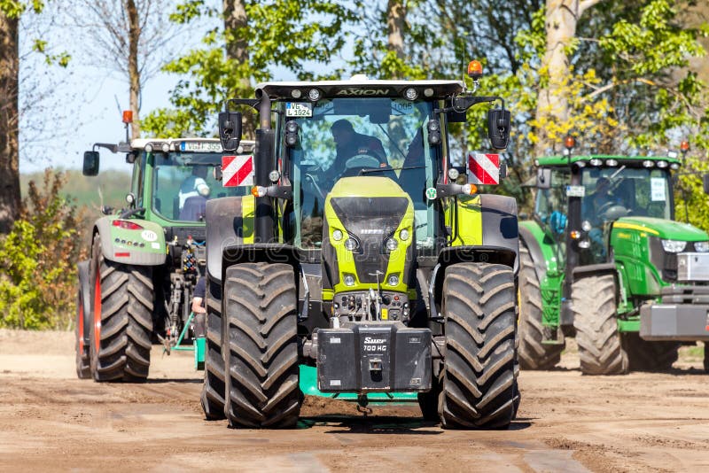 German Claas Axion Tractor Drives on Track by a Traktor Pulling Event ...