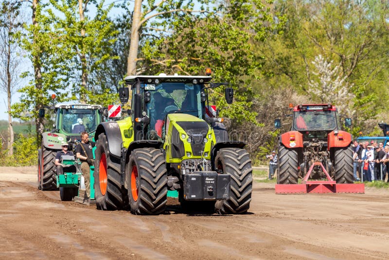 German Claas Axion Tractor Drives on Track by a Traktor Pulling Event ...