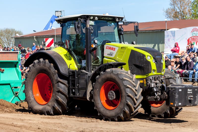 German Claas Axion Tractor Drives on Track by a Traktor Pulling Event ...