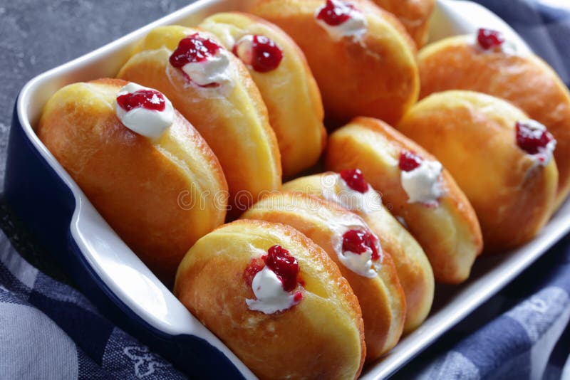 German Donuts with Raspberry Jam and Cream Stock Photo - Image of ...