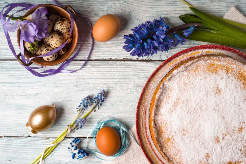 German Easter Cake with Decoration and Flower on the White Wooden Table ...