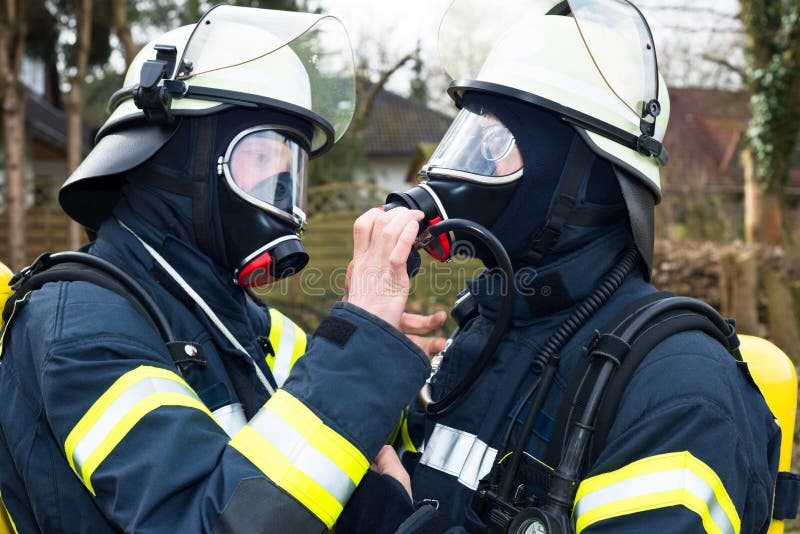 German Firefighters with Helmet and Respirator Editorial Image - Image ...